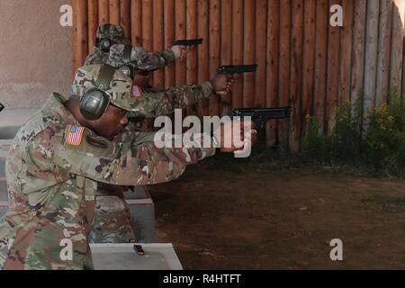 US Army Soldiers from NRDC Spain fire an M9 9mm pistol during ...