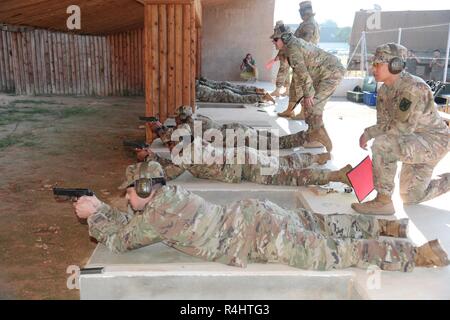 US Army Soldiers from NRDC Spain fire an M9 9mm pistol during ...