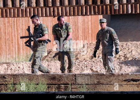 US Army Soldiers from NRDC Spain fire an M9 9mm pistol during ...