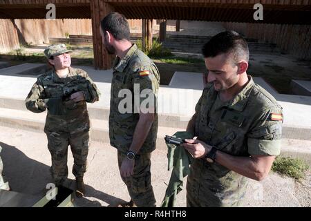 US Army Soldier from NRDC Spain fires an M9 9mm pistol during ...