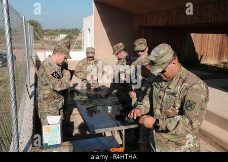 US Army Soldiers from NRDC Spain and a Spanish Soldier from NRDC Spain ...