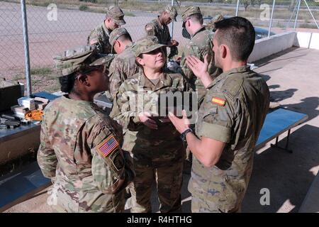 US Army Soldier from NRDC Spain and a Spanish Soldier from NRDC Spain ...