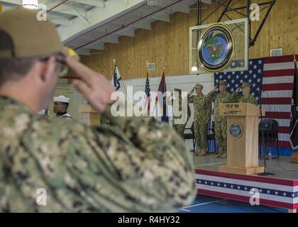 Capt. Robert A. Baughman gives his remarks during a change of command ...