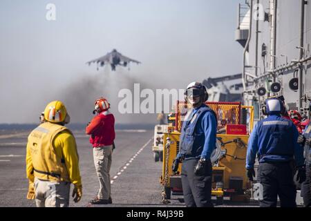 US Navy Sailors observe as a final checker signals safe for launching ...