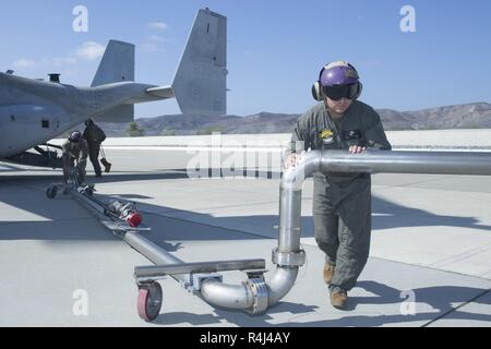 U.S. Marine Corps bulk fueling specialists with Marine Medium Tiltrotor ...