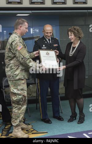 U.S. Army Chaplain Col. Brett Charsky (left) and Chaplains Assistant Sgt. Clayton Merchant ...