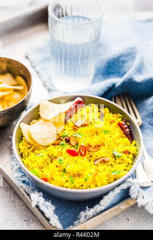 bowl of red rice on grey place mat Stock Photo - Alamy