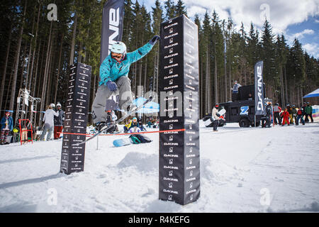 BUKOVEL,UKRAINE-20 MARCH,2018: Snowboard contest in winter park.Young ...