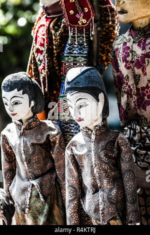 Traditional toy puppets made of wood in souvenir shop Stock Photo - Alamy