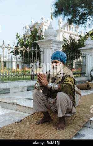 Armed, old Indian Sikh warrior (nihang) with his traditional lance ...