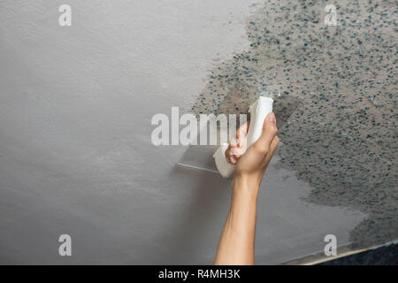 Pasting liquid wallpaper Stock Photo - Alamy