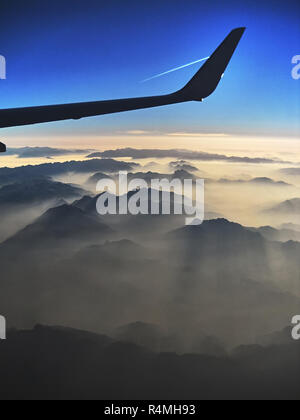 Nice sunrise view from airplane Stock Photo - Alamy