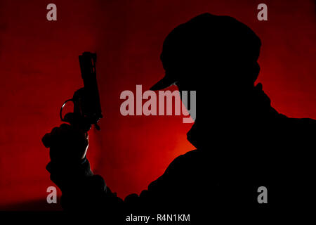 shadow of a man with a gun Stock Photo - Alamy
