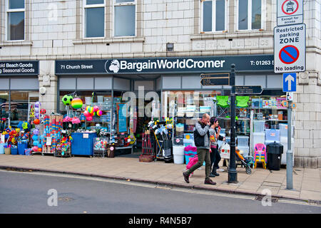 Colourful shop front selling seaside products on the seafront at ...