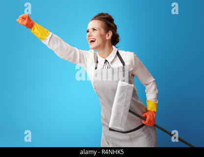 Young Superhero Janitor In Blue Cape Holding Cleaning Equipments Stock ...