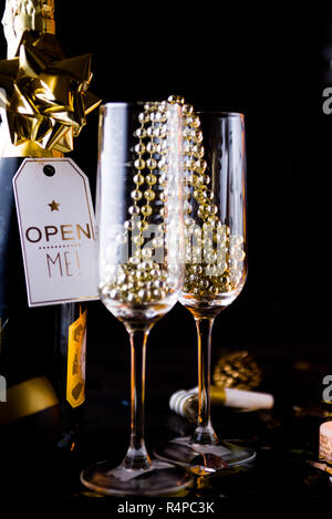 Christmas and New Year's card with a small artificial green tree and ...