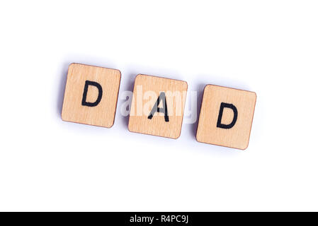 The word DAD spelt with wooden letter tiles Stock Photo - Alamy