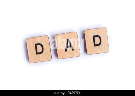 The word DAD spelt with wooden letter tiles Stock Photo - Alamy