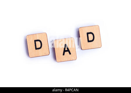 The word DAD spelt with wooden letter tiles Stock Photo - Alamy