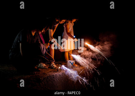 Kids Playing Fireworks Stock Photo - Alamy