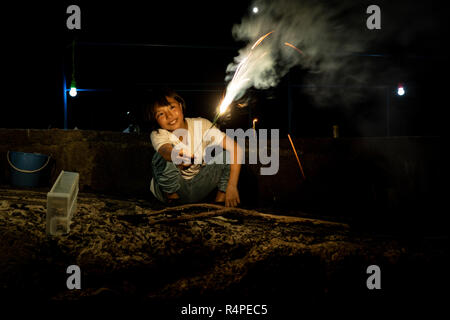 Kids Playing Fireworks Stock Photo - Alamy