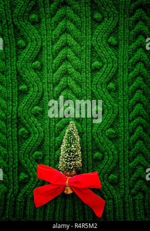 close-up of winter xmas knitted cozy gloves on wooden table Stock Photo ...