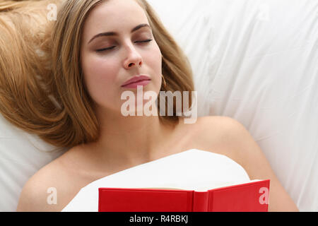 Woman fall asleep with book Stock Photo - Alamy