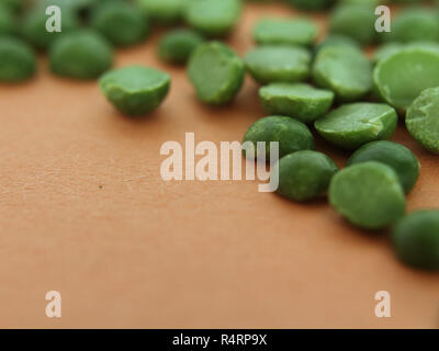 Green split peas, complementary colors Stock Photo - Alamy