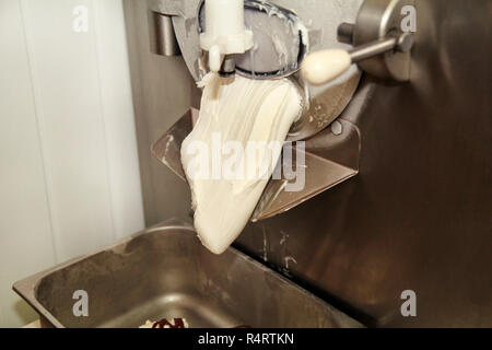 Ice cream making process at ice cream factory, milk and cooking mixing ...