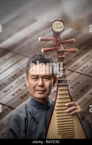 Pipa, retro Chinese musical instrument. Black background Stock Photo ...
