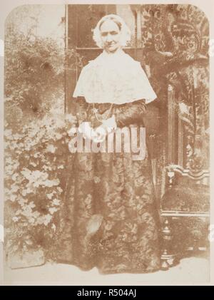 Mrs. Rigby. Full-length standing portrait, taken out of doors and ...