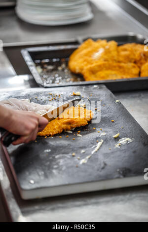 Roasted breaded german weiner schnitzel on a plate. Isolated, white ...