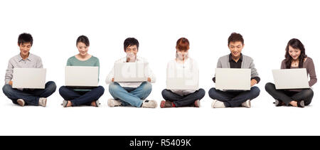 Six carefree cheerful young people dancing and having fun while meeting ...