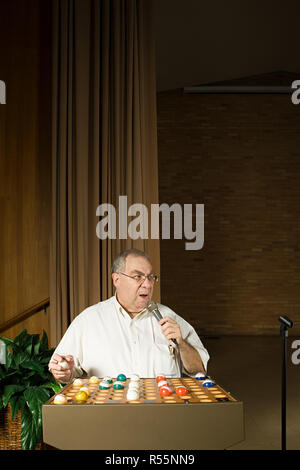 Bingo caller at work Stock Photo - Alamy