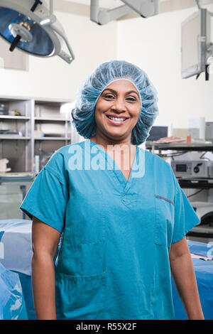 Laughing doctor in a theatre cap Stock Photo - Alamy