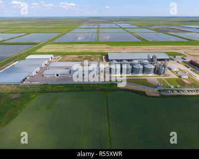 Grain elevator. Granary. Large metal structure grain elevator. Storage ...