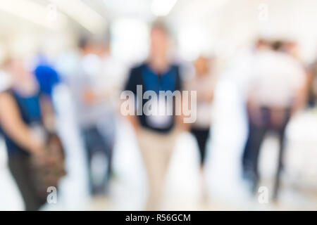 Abstract blurred people socializing during coffee break at business ...