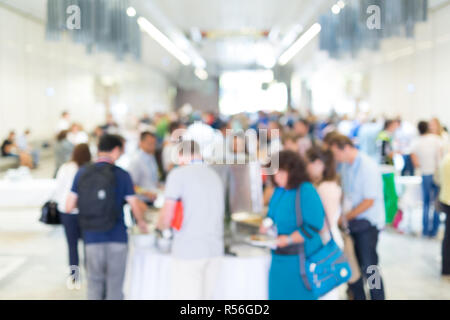 Abstract blurred people socializing during coffee break at business ...