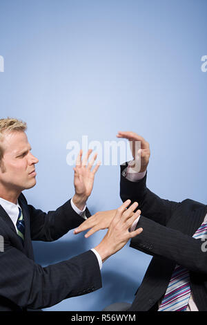 fighting businessmen shouting. photo of businessmen fighting with anger ...