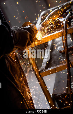 Close up of car mechanic hands removing fuel injectors Stock Photo - Alamy