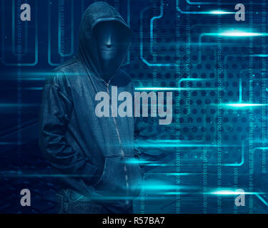 Hacker with mask on dark green digital screen background Stock Photo ...