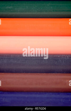 Six wax crayons, green, orange, blue, red, yellow and purple Stock ...