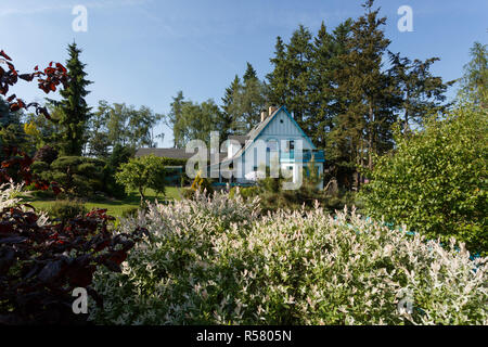 Peasant house in beautiful natural surroundings.Sunny autumn day. High ...