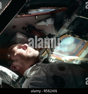 A heavy beard covers the face of astronaut Walter M. Schirra Jr., as he ...