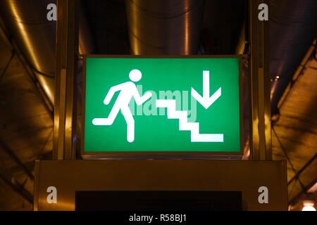 Large Emergency Exit sign with green light box is placed on BTS station ...