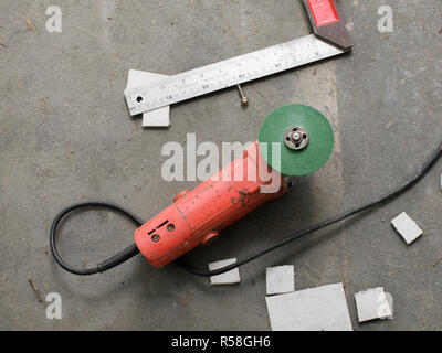 PLUGGED ELECTRIC GREEN WHEEL GRINDER Stock Photo - Alamy