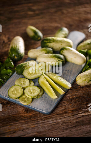 Organic mini cucumbers Stock Photo - Alamy