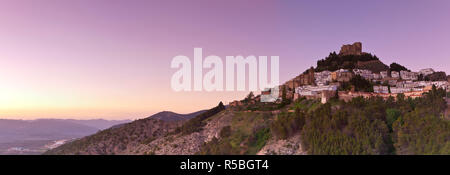 The Mudejar Castle overlooking the mountain village of Segura de la ...