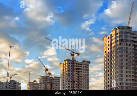 Construction of a new microdistrict with high houses, new buildings ...