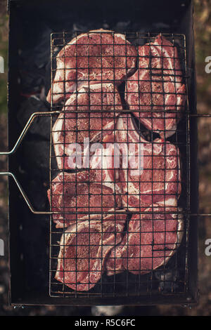 Grilling fresh entrecote pork Stock Photo - Alamy